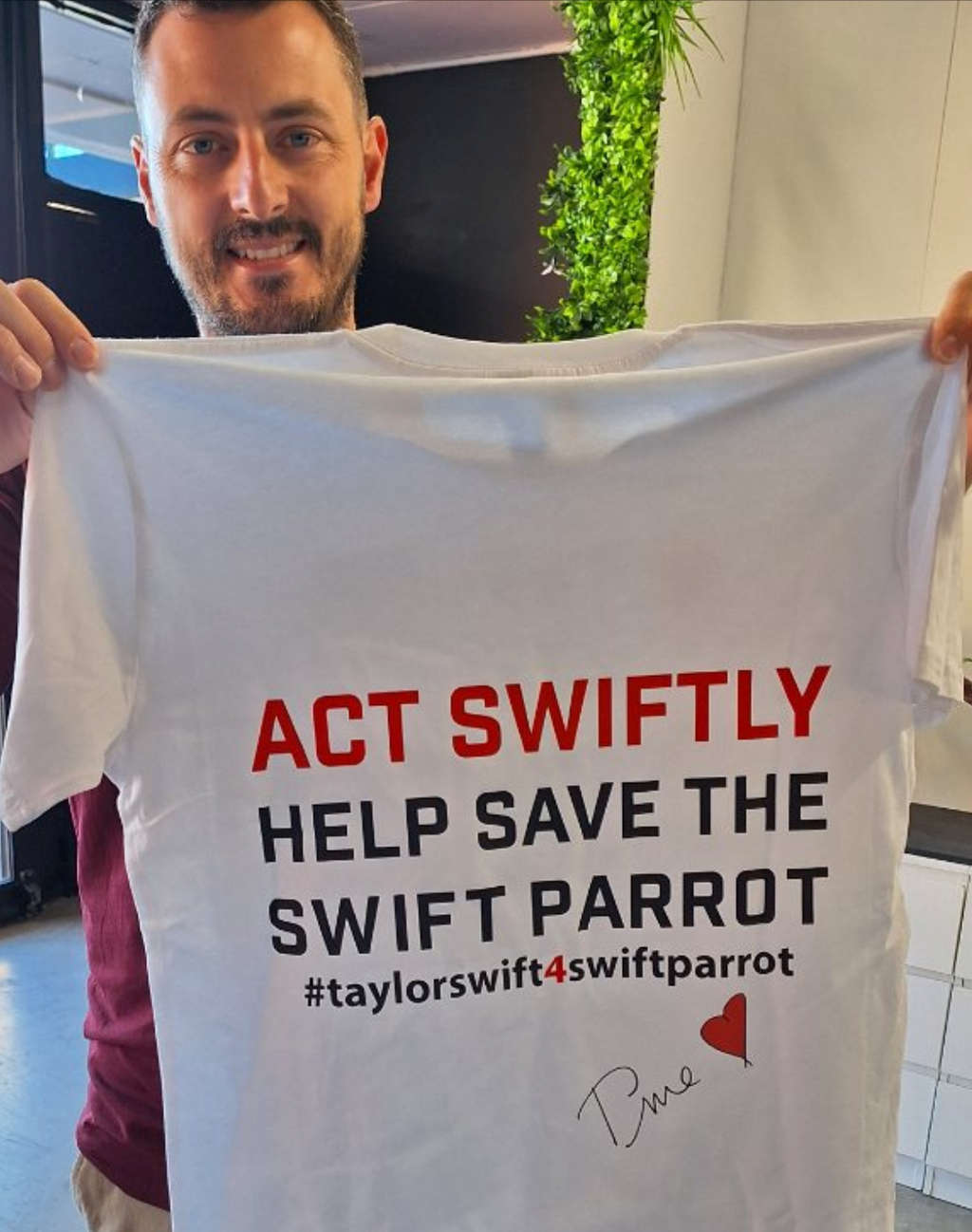 Taylor Swift Parrot Tee Launched - Tasmanian Times